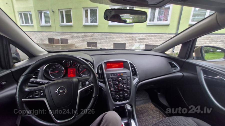 Brown Opel Astra 2014 in Tallinn, with an engine capacity of 1.60 L and mileage of 173 thousand km for 3950 €, photo 7 on AUTOMOTO.COM.LV