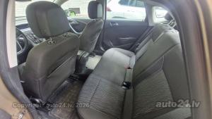 Brown Opel Astra 2014 in Tallinn, with an engine capacity of 1.60 L and mileage of 173 thousand km for 3950 €, photo 8 on AUTOMOTO.COM.LV