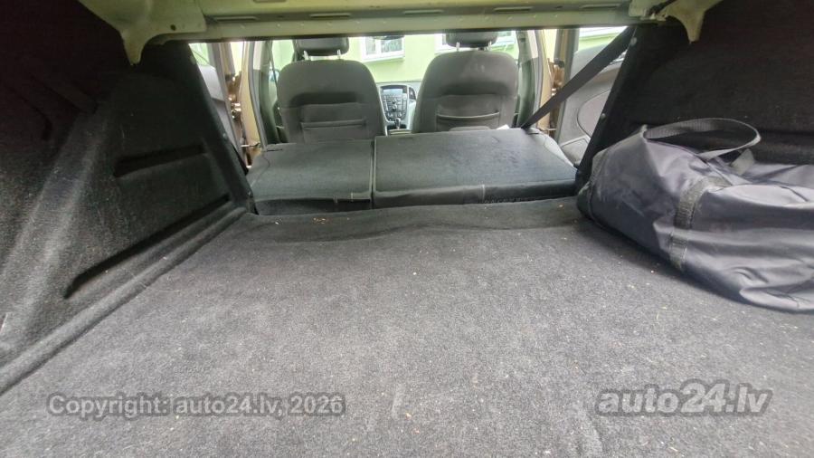 Brown Opel Astra 2014 in Tallinn, with an engine capacity of 1.60 L and mileage of 173 thousand km for 3950 €, photo 11 on AUTOMOTO.COM.LV