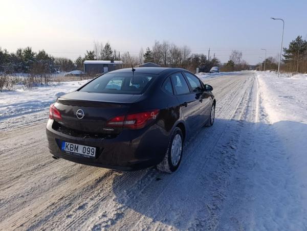 Brown Opel Astra 2017 in Vilnius, with an engine capacity of 1.40 L and mileage of 116 thousand km for 8000 €, photo 6 on AUTOMOTO.COM.LV