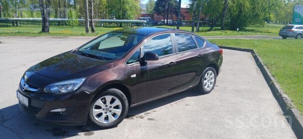 Brown Opel Astra 2018 in Riga, with an engine capacity of 1.60 L and mileage of 113 thousand km for 7650 €, photo 1 on AUTOMOTO.COM.LV