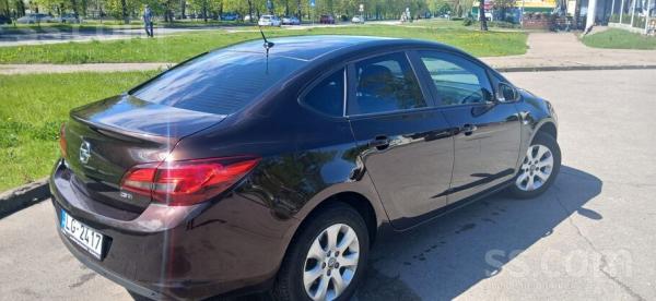 Brown Opel Astra 2018 in Riga, with an engine capacity of 1.60 L and mileage of 113 thousand km for 7650 €, photo 2 on AUTOMOTO.COM.LV