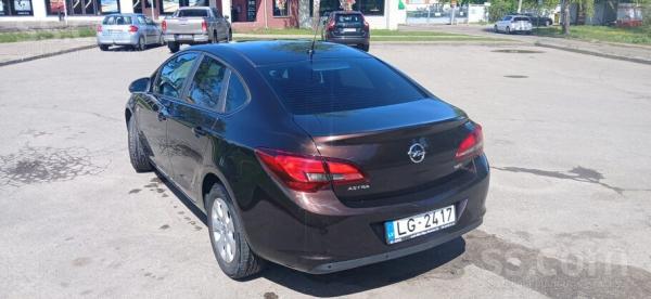 Brown Opel Astra 2018 in Riga, with an engine capacity of 1.60 L and mileage of 113 thousand km for 7650 €, photo 3 on AUTOMOTO.COM.LV