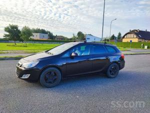 Brown Opel Astra 2011 in Riga, with an engine capacity of 1.70 L and mileage of 282 thousand km for 2000 €, photo  on AUTOMOTO.COM.LV