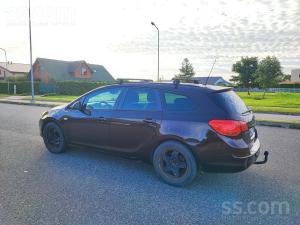 Brūns Opel Astra 2011 Rīga, ar dzinēja tilpumu 1.70 L un nobraukumu 282 tūkst. km par 2000 €, foto 3 vietnē AUTOMOTO.COM.LV