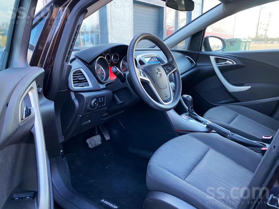 Brown Opel Astra 2012 in Cesis, with an engine capacity of 1.40 L and mileage of 225 thousand km for 5150 €, photo 19 on AUTOMOTO.COM.LV