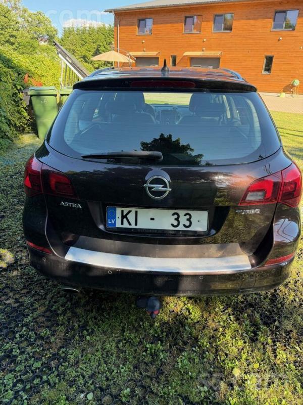 Brown Opel Astra 2012 in Cesis, with an engine capacity of 1.60 L and mileage of 0 thousand km for 4900 €, photo 4 on AUTOMOTO.COM.LV