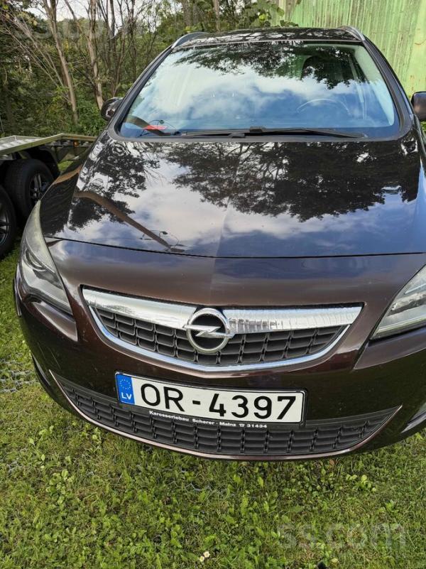 Brūns Opel Astra 2012 Cēsis, ar dzinēja tilpumu 1.60 L un nobraukumu 201 tūkst. km par 4300 €, foto 5 vietnē AUTOMOTO.COM.LV