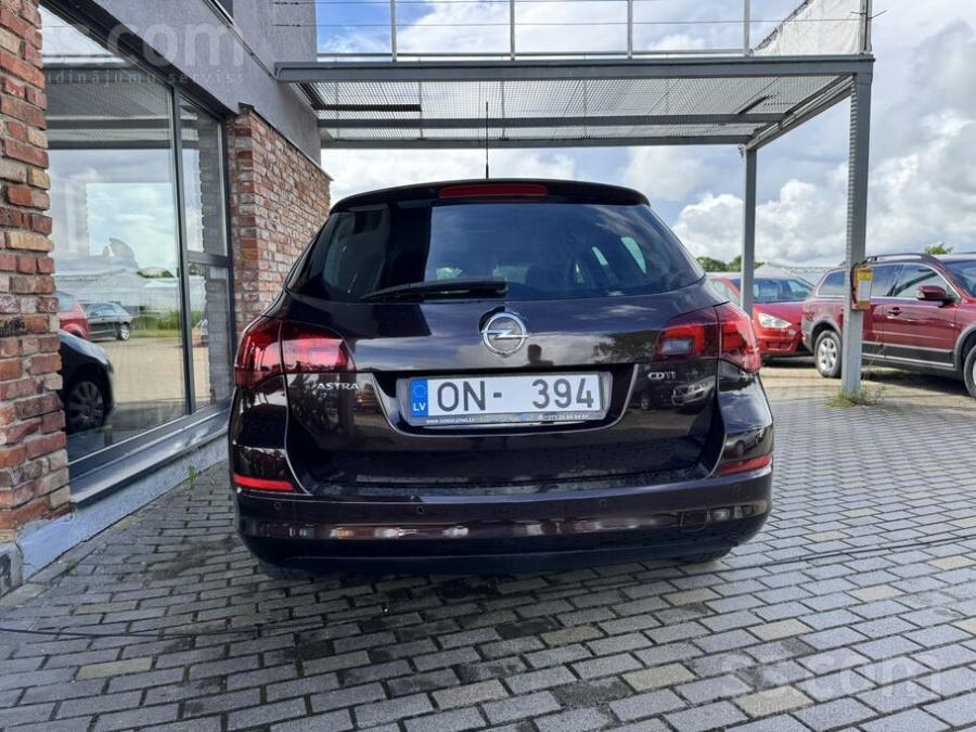 Brown Opel Astra 2012 in Talsi, with an engine capacity of 1.70 L and mileage of 250 thousand km for 4800 €, photo 6 on AUTOMOTO.COM.LV