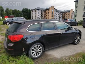 Brown Opel Astra 2012 in Riga, with an engine capacity of 1.60 L and mileage of 164 thousand km for 4450 €, photo 6 on AUTOMOTO.COM.LV