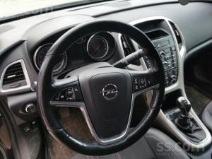 Brown Opel Astra 2012 in Riga, with an engine capacity of 1.60 L and mileage of 164 thousand km for 4450 €, photo 7 on AUTOMOTO.COM.LV