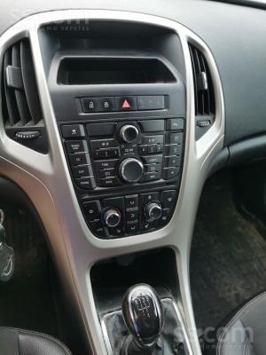 Brown Opel Astra 2012 in Riga, with an engine capacity of 1.60 L and mileage of 164 thousand km for 4450 €, photo 8 on AUTOMOTO.COM.LV