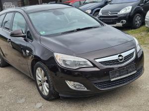 Brown Opel Astra 2012 in Kluonaliai, with an engine capacity of 1.70 L and mileage of 279 thousand km for 2499 €, photo 3 on AUTOMOTO.COM.LV