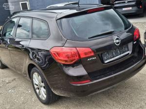 Brown Opel Astra 2012 in Kluonaliai, with an engine capacity of 1.70 L and mileage of 279 thousand km for 2499 €, photo 6 on AUTOMOTO.COM.LV