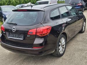 Brown Opel Astra 2012 in Kluonaliai, with an engine capacity of 1.70 L and mileage of 279 thousand km for 2499 €, photo 7 on AUTOMOTO.COM.LV