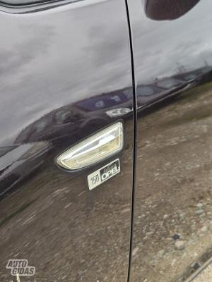 Brown Opel Astra 2012 in Kluonaliai, with an engine capacity of 1.70 L and mileage of 279 thousand km for 2499 €, photo 12 on AUTOMOTO.COM.LV