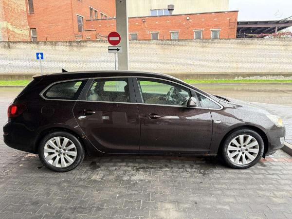Brūns Opel Astra 2012 Viļņa, ar dzinēja tilpumu 1.69 L un nobraukumu 198 tūkst. km par 2200 €, foto 5 vietnē AUTOMOTO.COM.LV