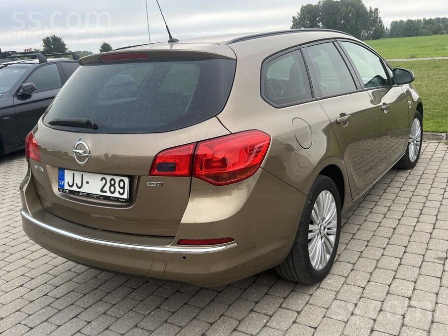 Brown Opel Astra 2013 in Cesis, with an engine capacity of 1.70 L and mileage of 270 thousand km for 3650 €, photo 11 on AUTOMOTO.COM.LV