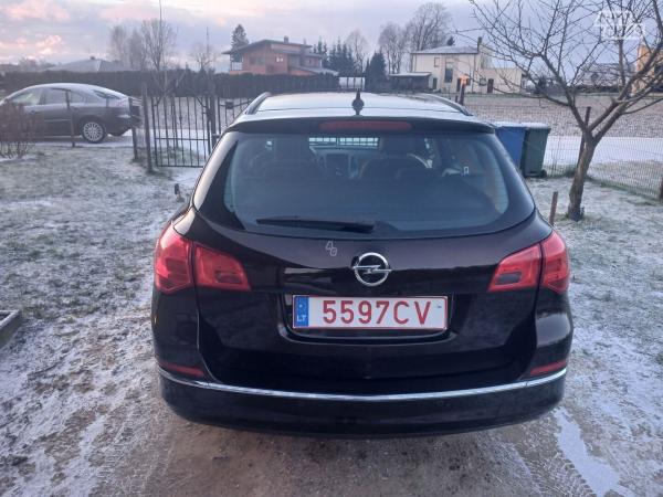 Brown Opel Astra 2014 in Sakiai, with an engine capacity of 1.60 L and mileage of 256 thousand km for 3800 €, photo 8 on AUTOMOTO.COM.LV