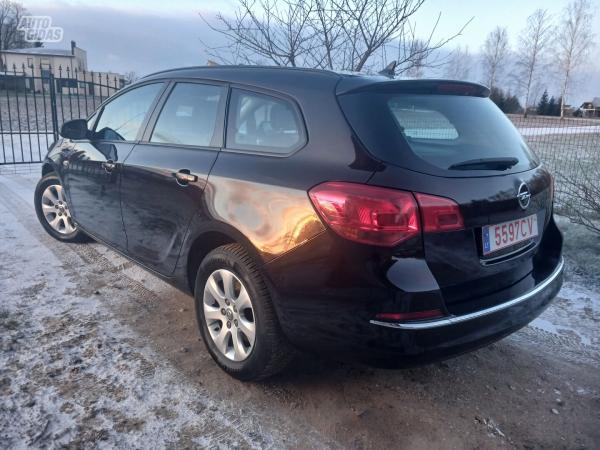 Brown Opel Astra 2014 in Sakiai, with an engine capacity of 1.60 L and mileage of 256 thousand km for 3800 €, photo 9 on AUTOMOTO.COM.LV