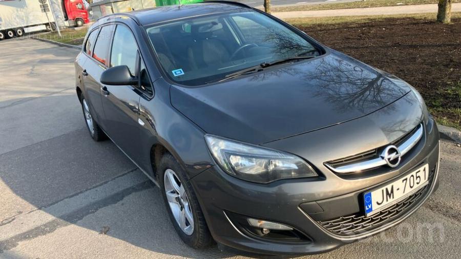 Brown Opel Astra 2014 in Riga, with an engine capacity of 1.70 L and mileage of 235 thousand km for 3700 €, photo 4 on AUTOMOTO.COM.LV
