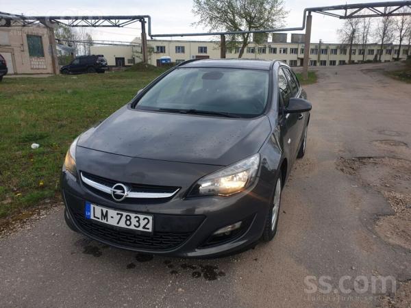 Brown Opel Astra 2016 in Riga, with an engine capacity of 1.60 L and mileage of 300 thousand km for 3750 €, photo 1 on AUTOMOTO.COM.LV