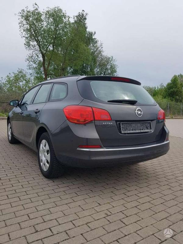 Brown Opel Astra 2016 in Marijampole, with an engine capacity of 1.40 L and mileage of 200 thousand km for 4350 €, photo 1 on AUTOMOTO.COM.LV