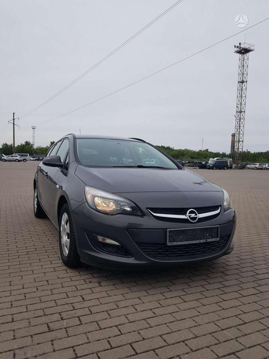 Brown Opel Astra 2016 in Marijampole, with an engine capacity of 1.40 L and mileage of 200 thousand km for 4350 €, photo 5 on AUTOMOTO.COM.LV