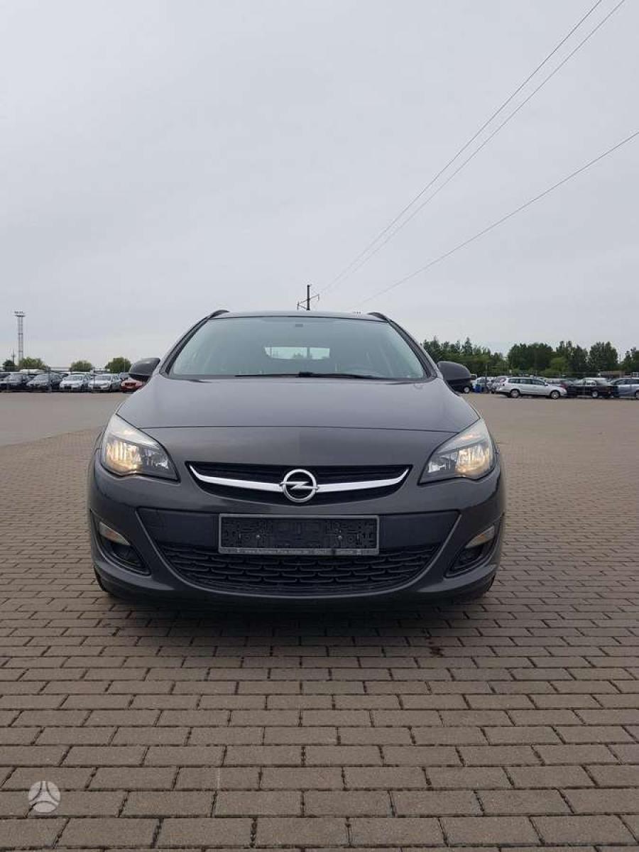Brown Opel Astra 2016 in Marijampole, with an engine capacity of 1.40 L and mileage of 200 thousand km for 4350 €, photo 6 on AUTOMOTO.COM.LV