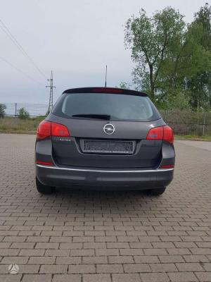 Brown Opel Astra 2016 in Marijampole, with an engine capacity of 1.40 L and mileage of 200 thousand km for 4350 €, photo 7 on AUTOMOTO.COM.LV
