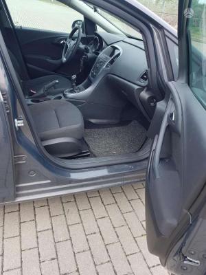 Brown Opel Astra 2016 in Marijampole, with an engine capacity of 1.40 L and mileage of 200 thousand km for 4350 €, photo 13 on AUTOMOTO.COM.LV