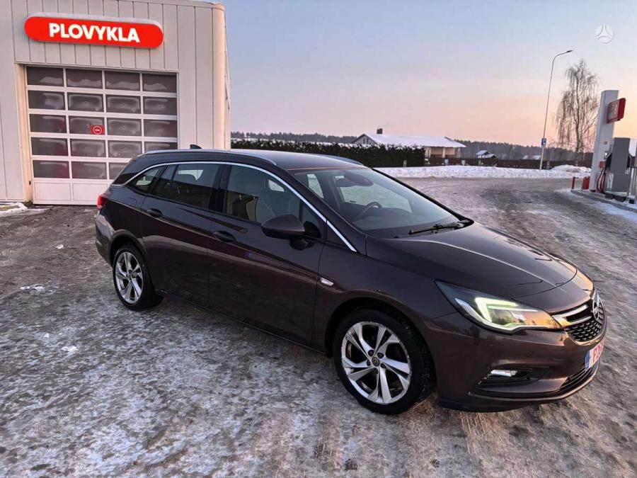 Brown Opel Astra 2017 in Taurage, with an engine capacity of 1.00 L and mileage of 140 thousand km for 4850 €, photo 4 on AUTOMOTO.COM.LV