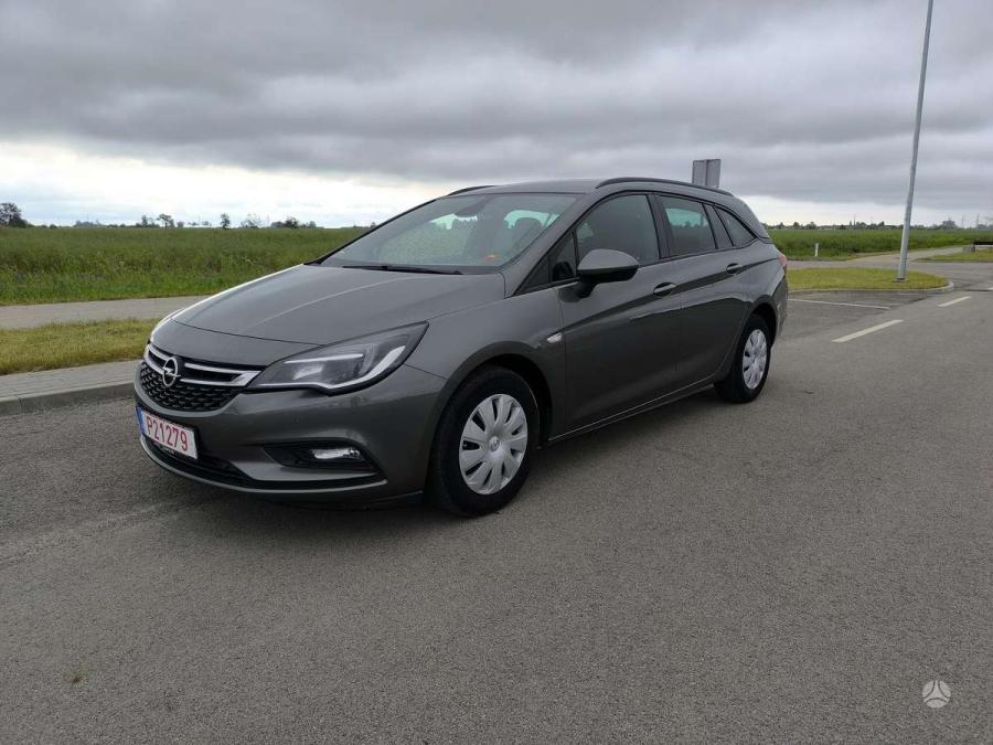 Brown Opel Astra 2017 in Marijampole, with an engine capacity of 1.60 L and mileage of 319 thousand km for 3999 €, photo 1 on AUTOMOTO.COM.LV