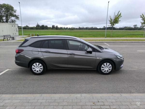 Brown Opel Astra 2017 in Marijampole, with an engine capacity of 1.60 L and mileage of 319 thousand km for 3999 €, photo 6 on AUTOMOTO.COM.LV
