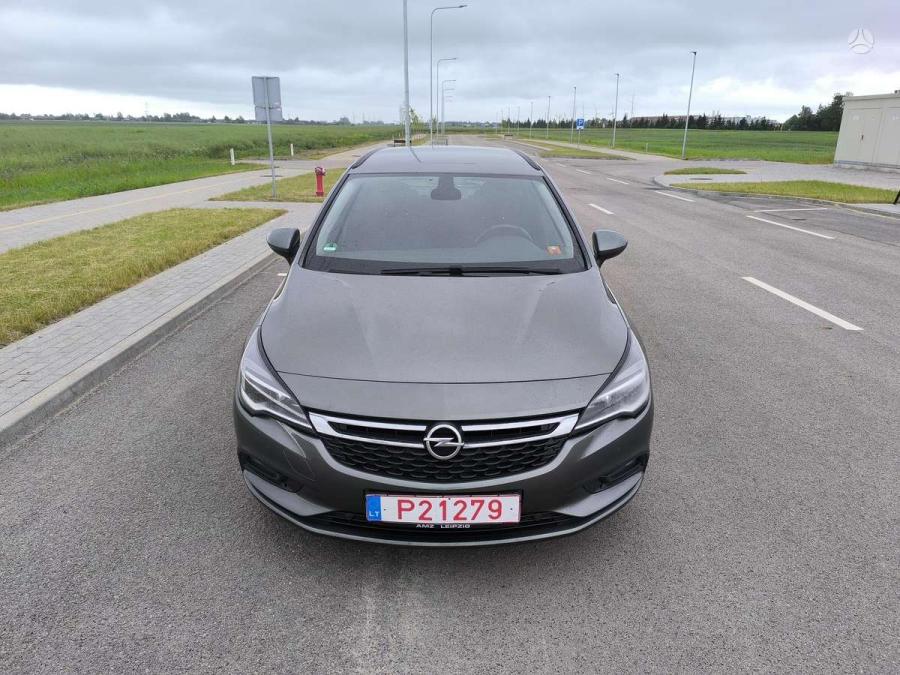 Brown Opel Astra 2017 in Marijampole, with an engine capacity of 1.60 L and mileage of 319 thousand km for 3999 €, photo 9 on AUTOMOTO.COM.LV