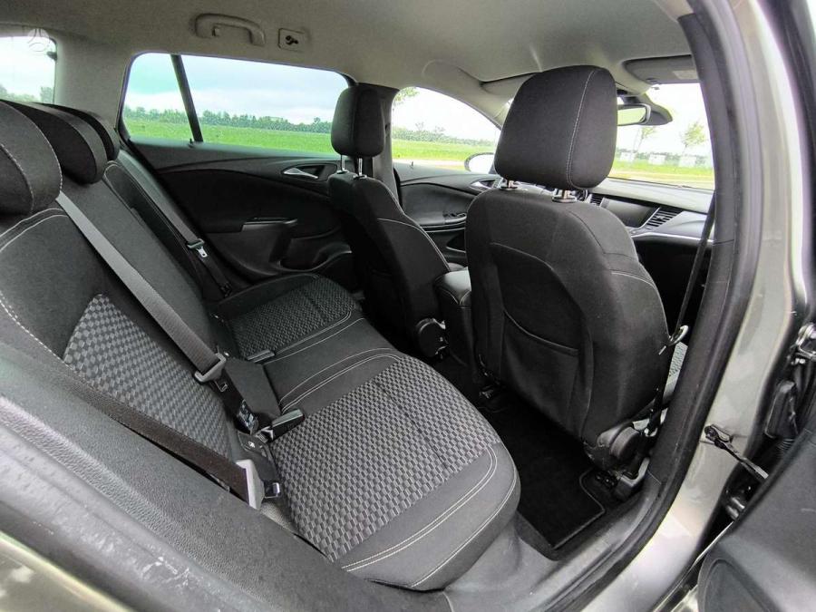 Brown Opel Astra 2017 in Marijampole, with an engine capacity of 1.60 L and mileage of 319 thousand km for 3999 €, photo 14 on AUTOMOTO.COM.LV