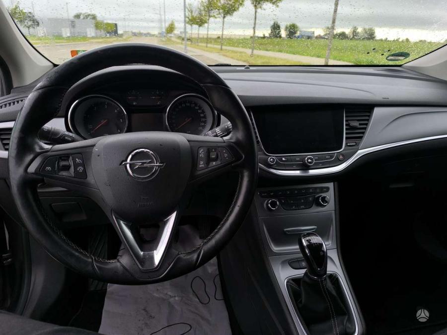 Brown Opel Astra 2017 in Marijampole, with an engine capacity of 1.60 L and mileage of 319 thousand km for 3999 €, photo 16 on AUTOMOTO.COM.LV