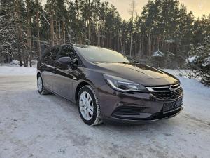 Brown Opel Astra 2018 in Ukmerge, with an engine capacity of 1.60 L and mileage of 216 thousand km for 5750 €, photo 5 on AUTOMOTO.COM.LV