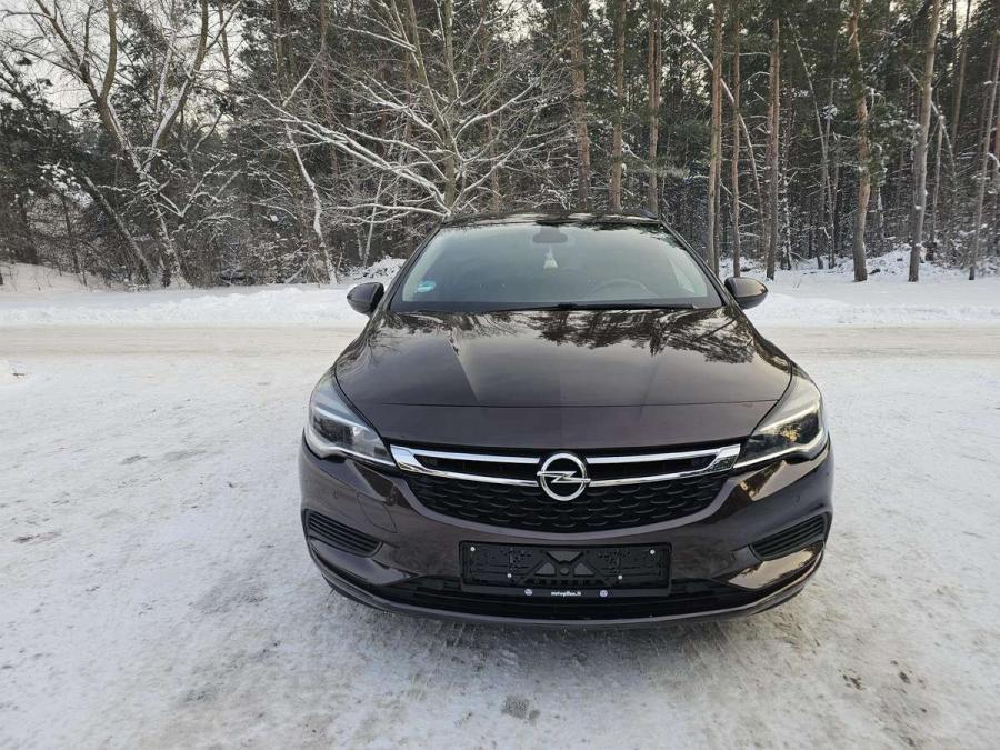 Brown Opel Astra 2018 in Ukmerge, with an engine capacity of 1.60 L and mileage of 216 thousand km for 5750 €, photo 14 on AUTOMOTO.COM.LV
