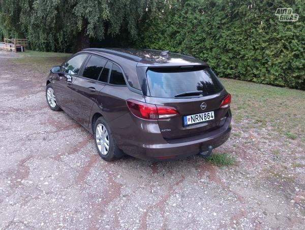 Brown Opel Astra 2018 in Kaunas, with an engine capacity of 1.60 L and mileage of 224 thousand km for 5500 €, photo 4 on AUTOMOTO.COM.LV
