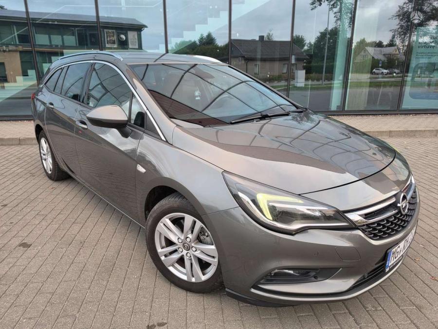 Brown Opel Astra 2018 in Utena, with an engine capacity of 1.60 L and mileage of 215 thousand km for 5600 €, photo 1 on AUTOMOTO.COM.LV