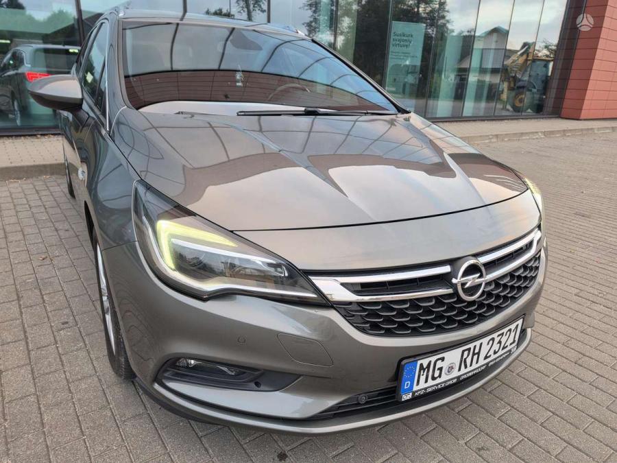 Brown Opel Astra 2018 in Utena, with an engine capacity of 1.60 L and mileage of 215 thousand km for 5600 €, photo 4 on AUTOMOTO.COM.LV