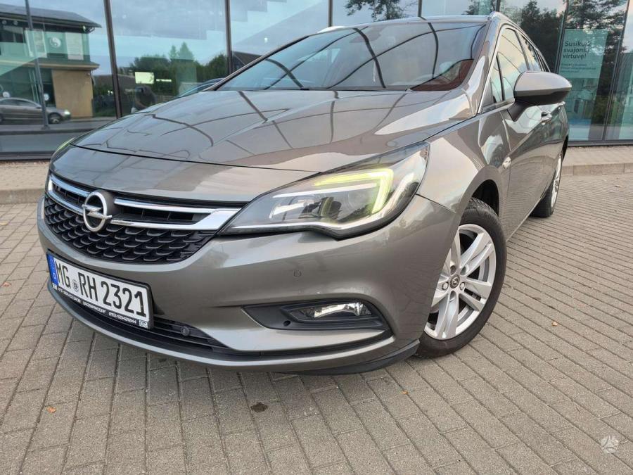 Brown Opel Astra 2018 in Utena, with an engine capacity of 1.60 L and mileage of 215 thousand km for 5600 €, photo 5 on AUTOMOTO.COM.LV