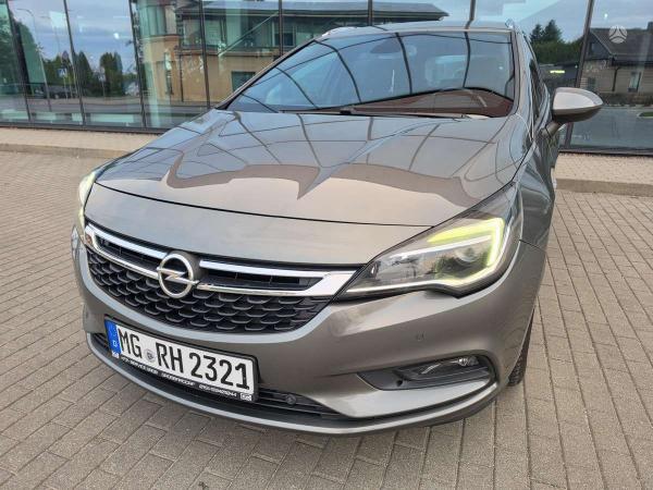Brown Opel Astra 2018 in Utena, with an engine capacity of 1.60 L and mileage of 215 thousand km for 5600 €, photo 7 on AUTOMOTO.COM.LV