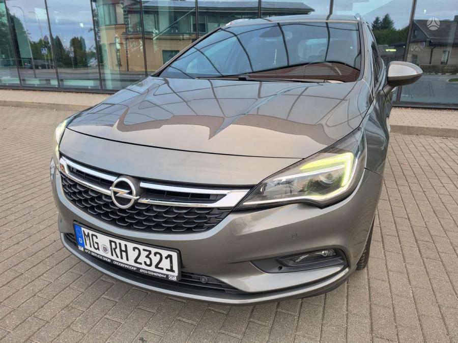 Brown Opel Astra 2018 in Utena, with an engine capacity of 1.60 L and mileage of 215 thousand km for 5600 €, photo 7 on AUTOMOTO.COM.LV