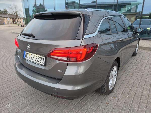 Brown Opel Astra 2018 in Utena, with an engine capacity of 1.60 L and mileage of 215 thousand km for 5600 €, photo 9 on AUTOMOTO.COM.LV