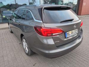 Brown Opel Astra 2018 in Utena, with an engine capacity of 1.60 L and mileage of 215 thousand km for 5600 €, photo 11 on AUTOMOTO.COM.LV