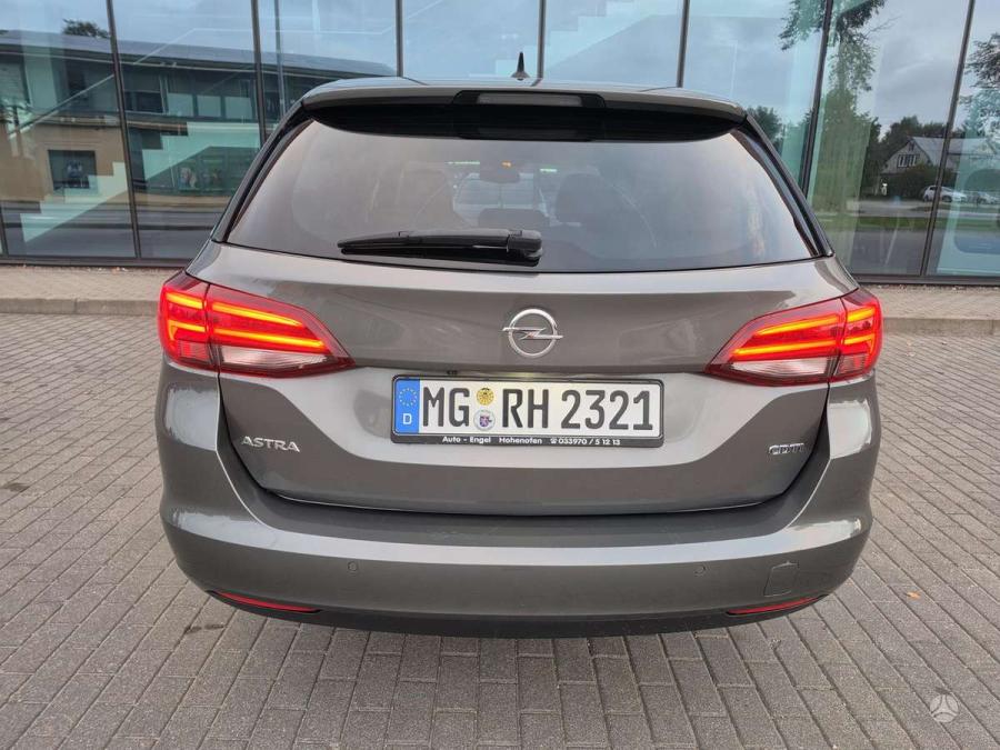 Brown Opel Astra 2018 in Utena, with an engine capacity of 1.60 L and mileage of 215 thousand km for 5600 €, photo 13 on AUTOMOTO.COM.LV