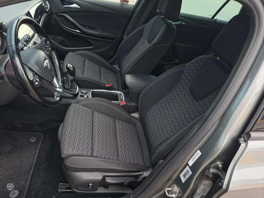 Brown Opel Astra 2018 in Utena, with an engine capacity of 1.60 L and mileage of 215 thousand km for 5600 €, photo 20 on AUTOMOTO.COM.LV