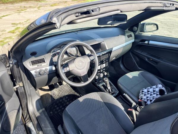 Opel Astra 2008 in Kaunas, with an engine capacity of 1.90 L and mileage of 310 thousand km for 1798 €, photo 7 on AUTOMOTO.COM.LV